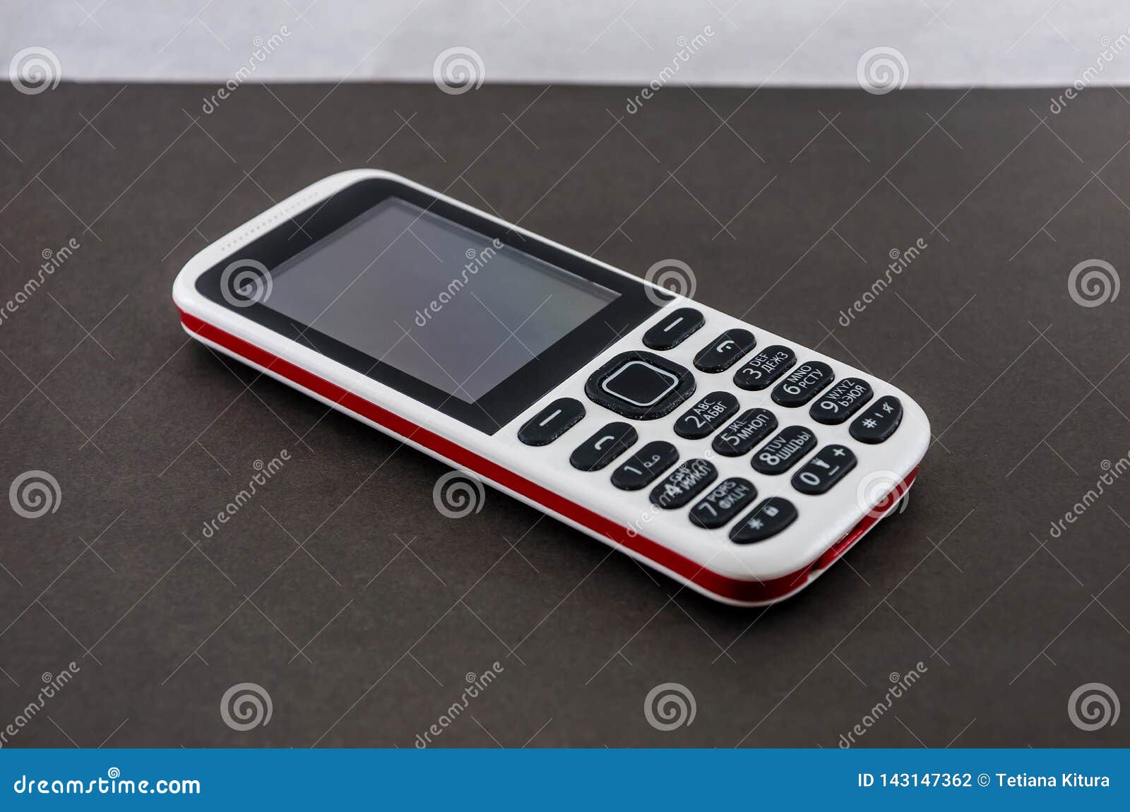 Push-button Mobile Phone on a Gray Background Stock Photo - Image of ...