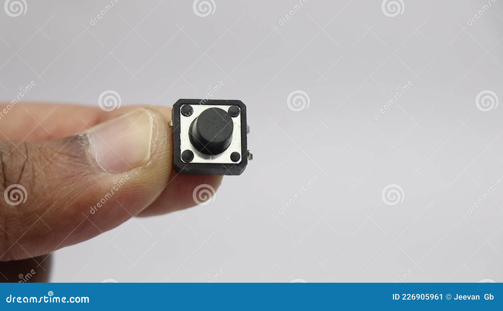 Push Button Switch Used for Electronic Projects Held in Hand Stock ...