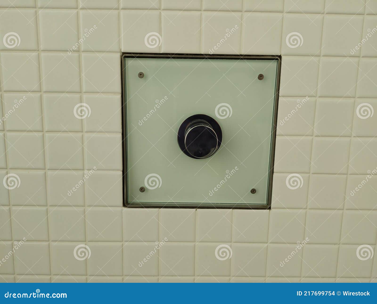 Push-button on a Tiled Wall Stock Photo - Image of switch, device ...