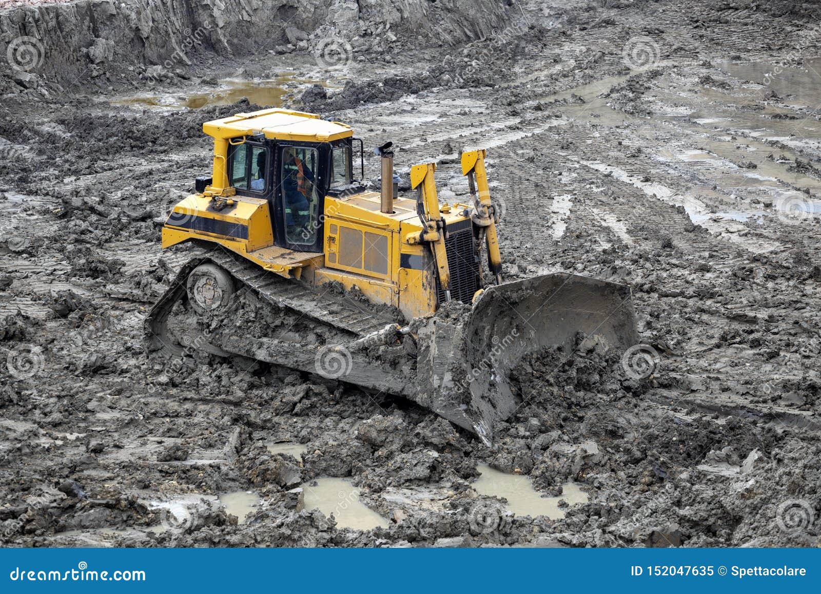 Push dirt with a dozer stock image. Image of hydraulic - 152047635