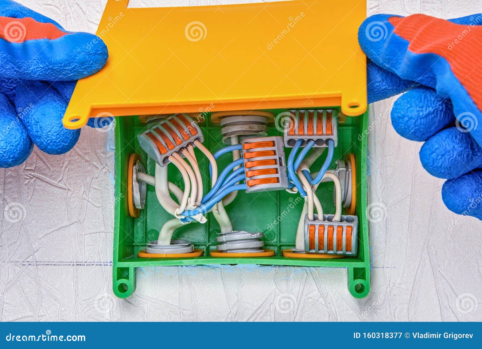 Electrician Closes the Cover of a Electrical Box Stock Image - Image of ...