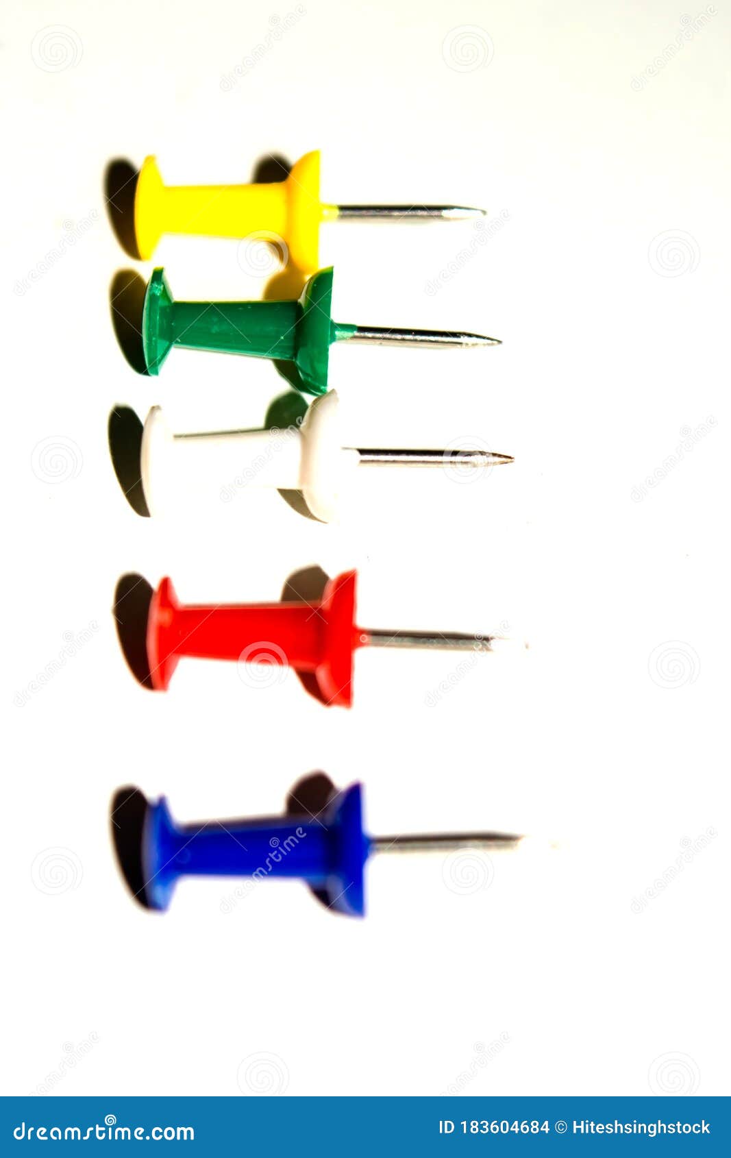 Push Pins and Paper Clips in Different Colors Isolated on White ... Push Pins and Paper Clips in Different Colors Isolated on White ...