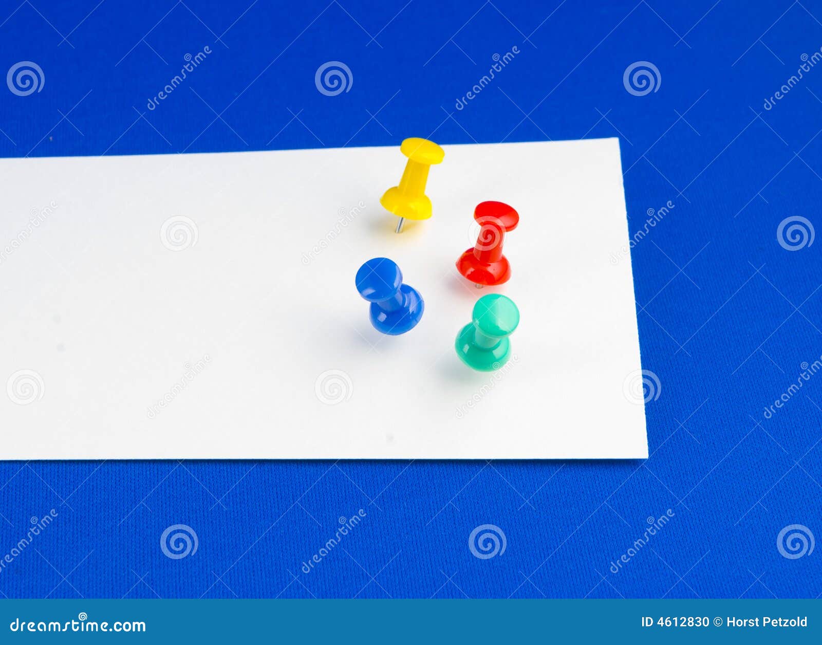 Push pins on white paper. stock photo. Image of close - 4612830