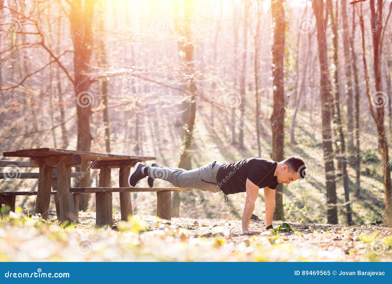 Young Sport Man Doing Push-ups with Bench in Nature Stock Image - Image ...