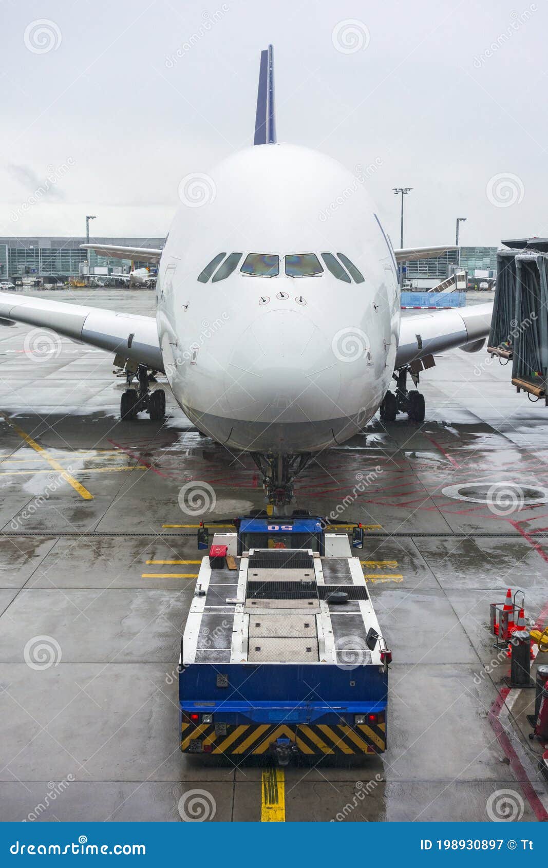 Towbarless Pushback Tractors In Airports Stock Photo | CartoonDealer ...