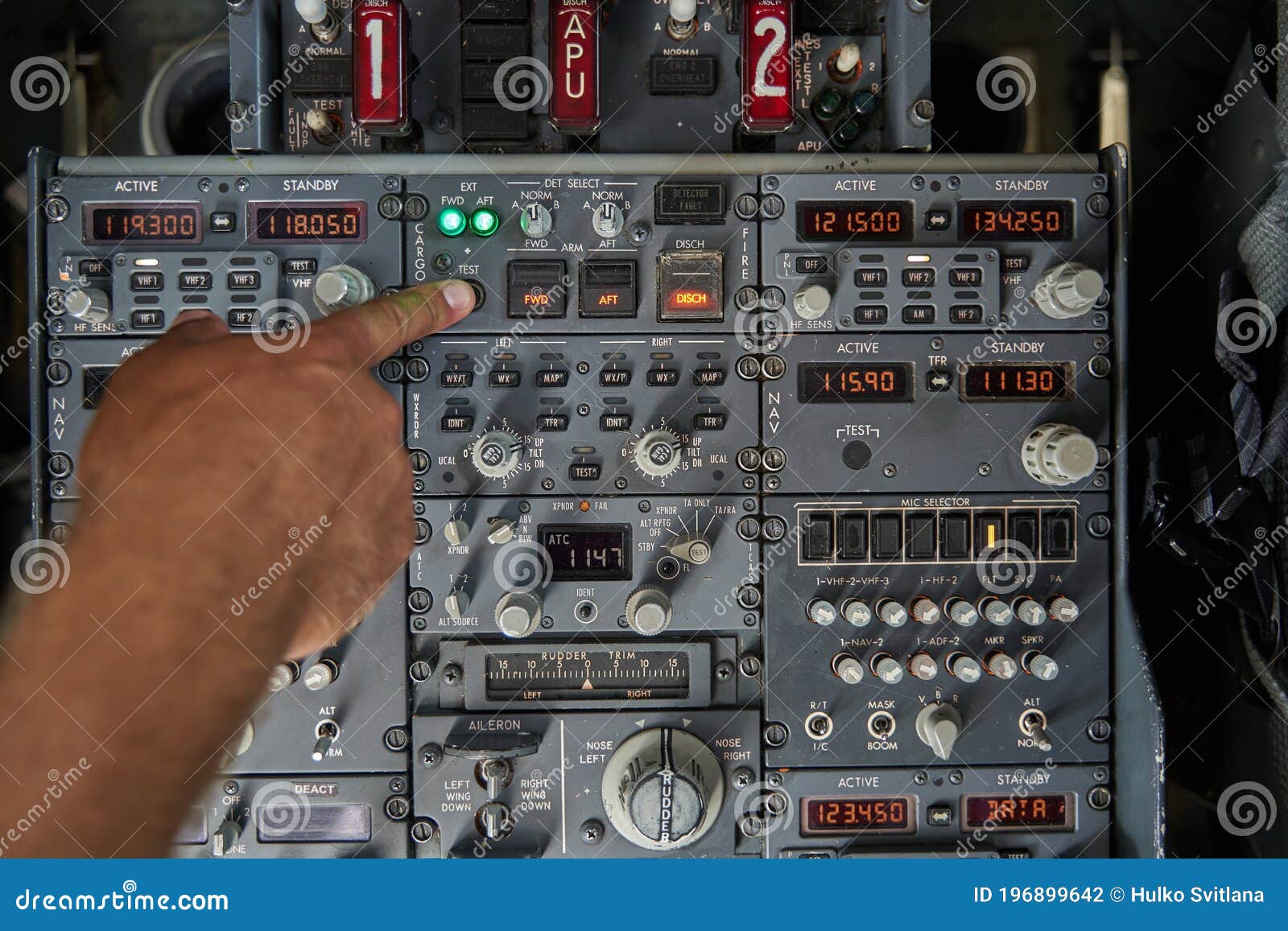 Pushing the Button on Control Panel while Piloting the Plane Stock ...