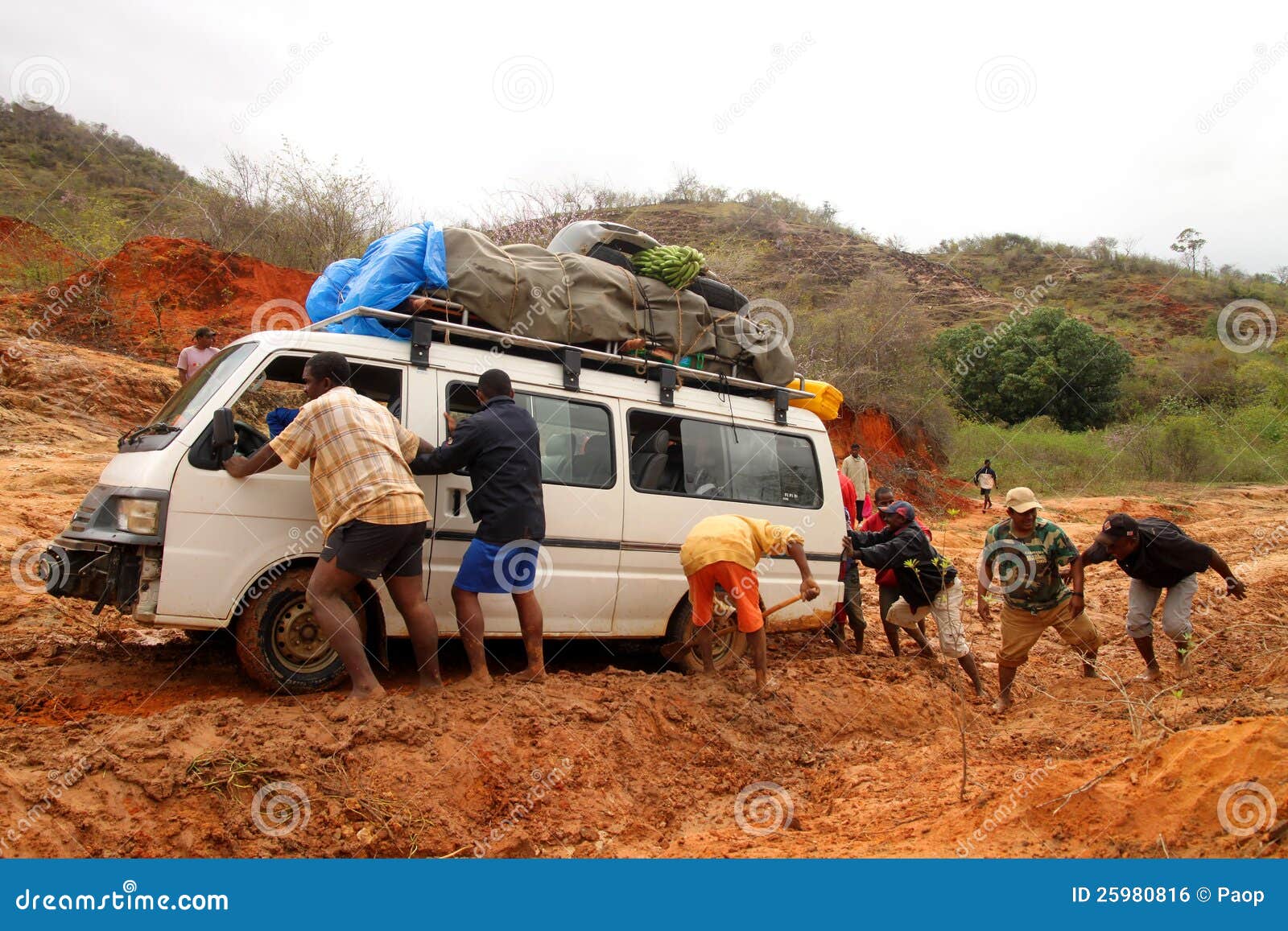 Pushing the car out of mud editorial photo. Image of malagasy - 25980816
