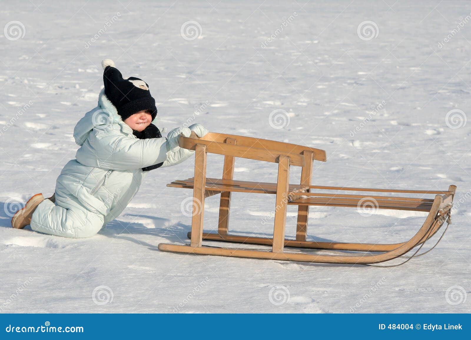 Pushing my sled stock photo. Image of outside, sleigh, play - 484004