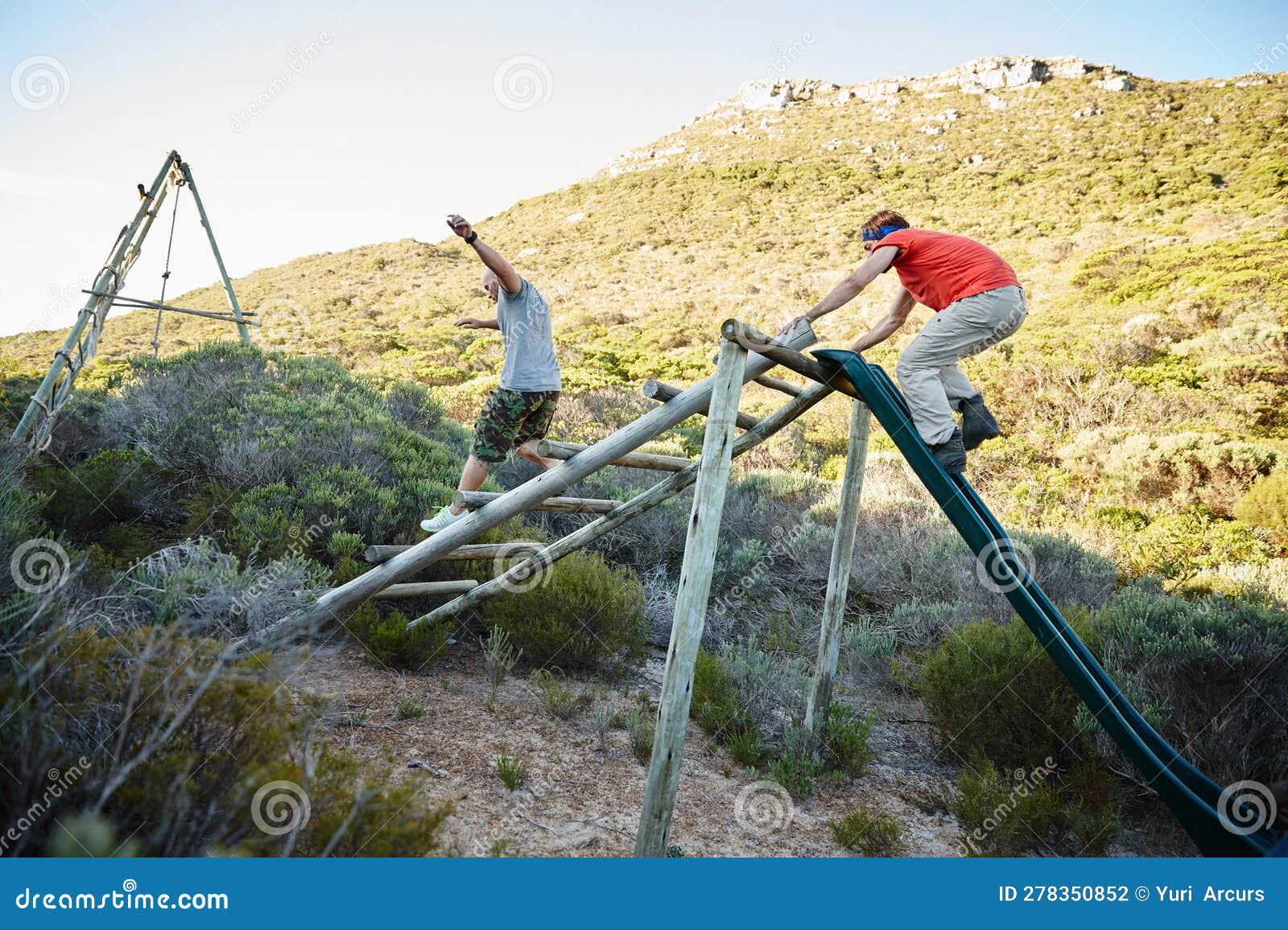 Pushing Their Bodies To the Limit. Young Men Going through an Obstacle ...