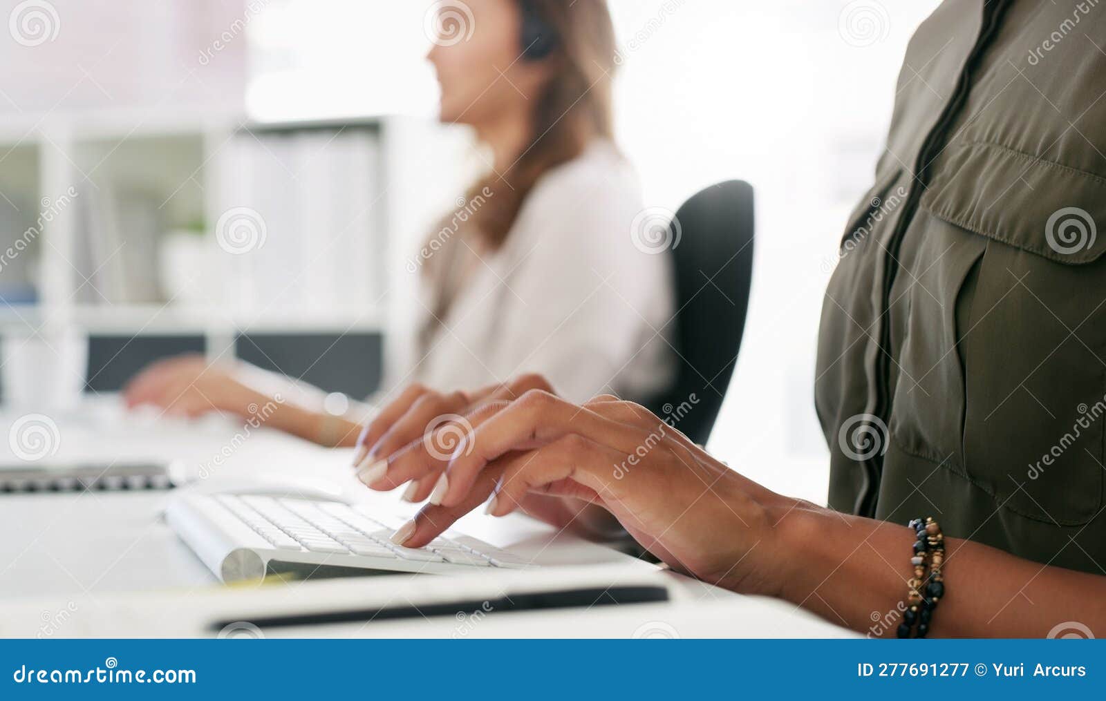 Put Your Queries in Her Hands. an Unrecognisable Woman Using a Computer ...