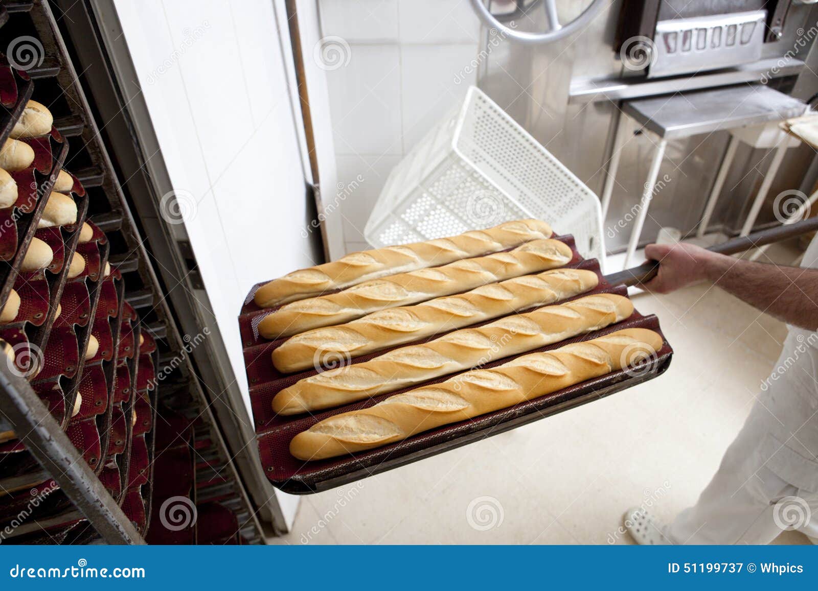 Puting Fresh Baked Baguette Bread into the Rack Stock Image - Image of ...