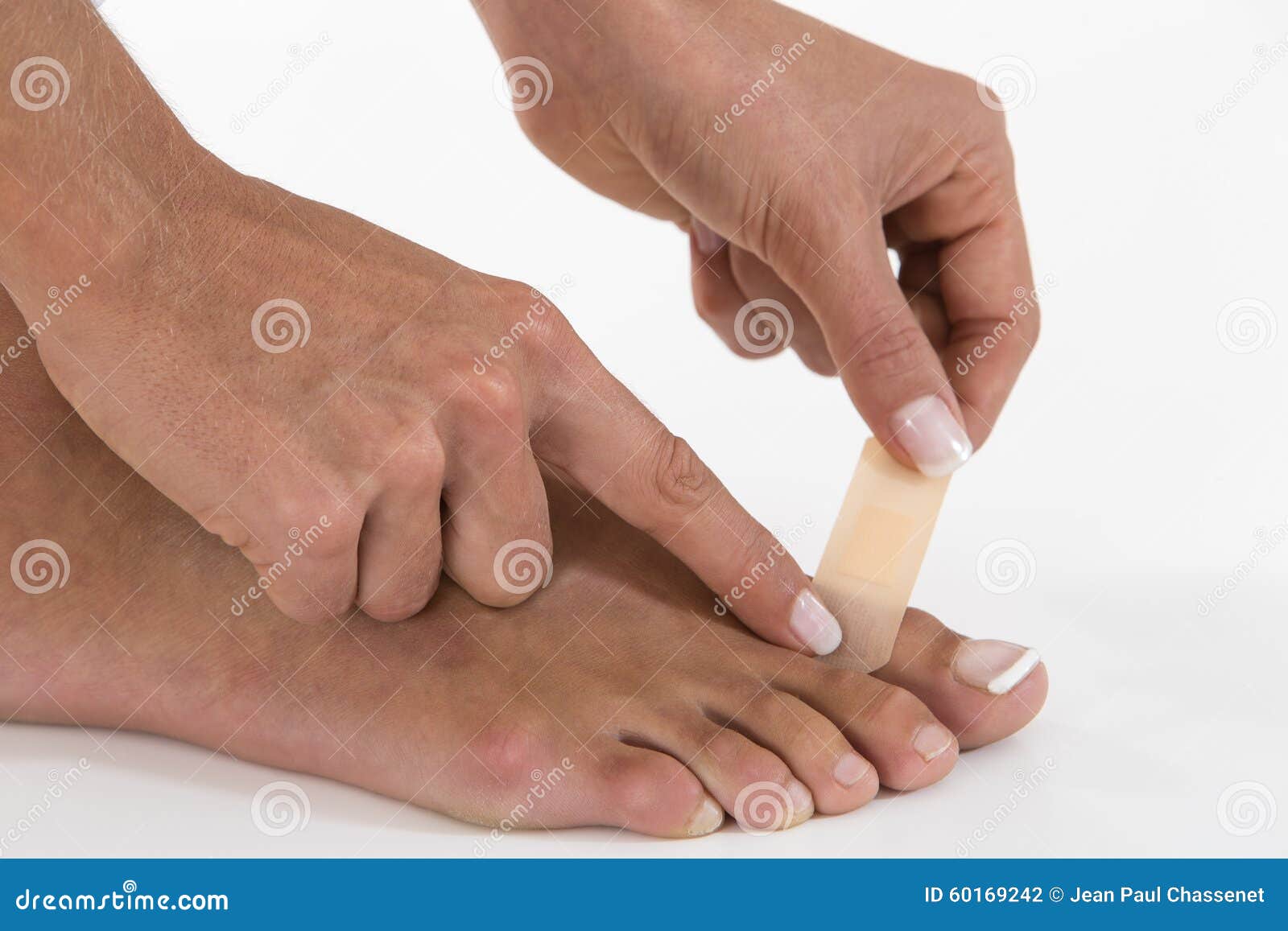 Putting Bandage on Foot Thumb Stock Photo - Image of healing, bandage ...