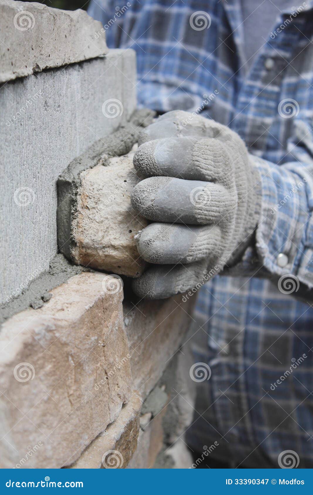 Putting Brick in Place stock image. Image of detail, tools - 33390347