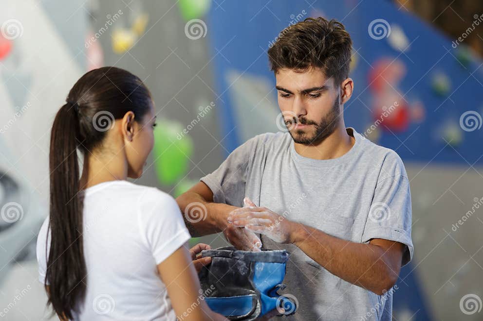 Putting Chalk on Talc on Hands Stock Image - Image of couple, preparing ...
