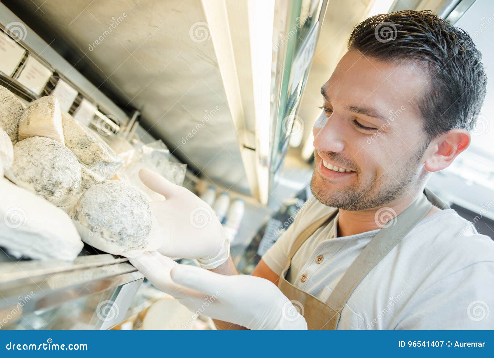 Putting cheese in fridge stock image. Image of male, cultured - 96541407