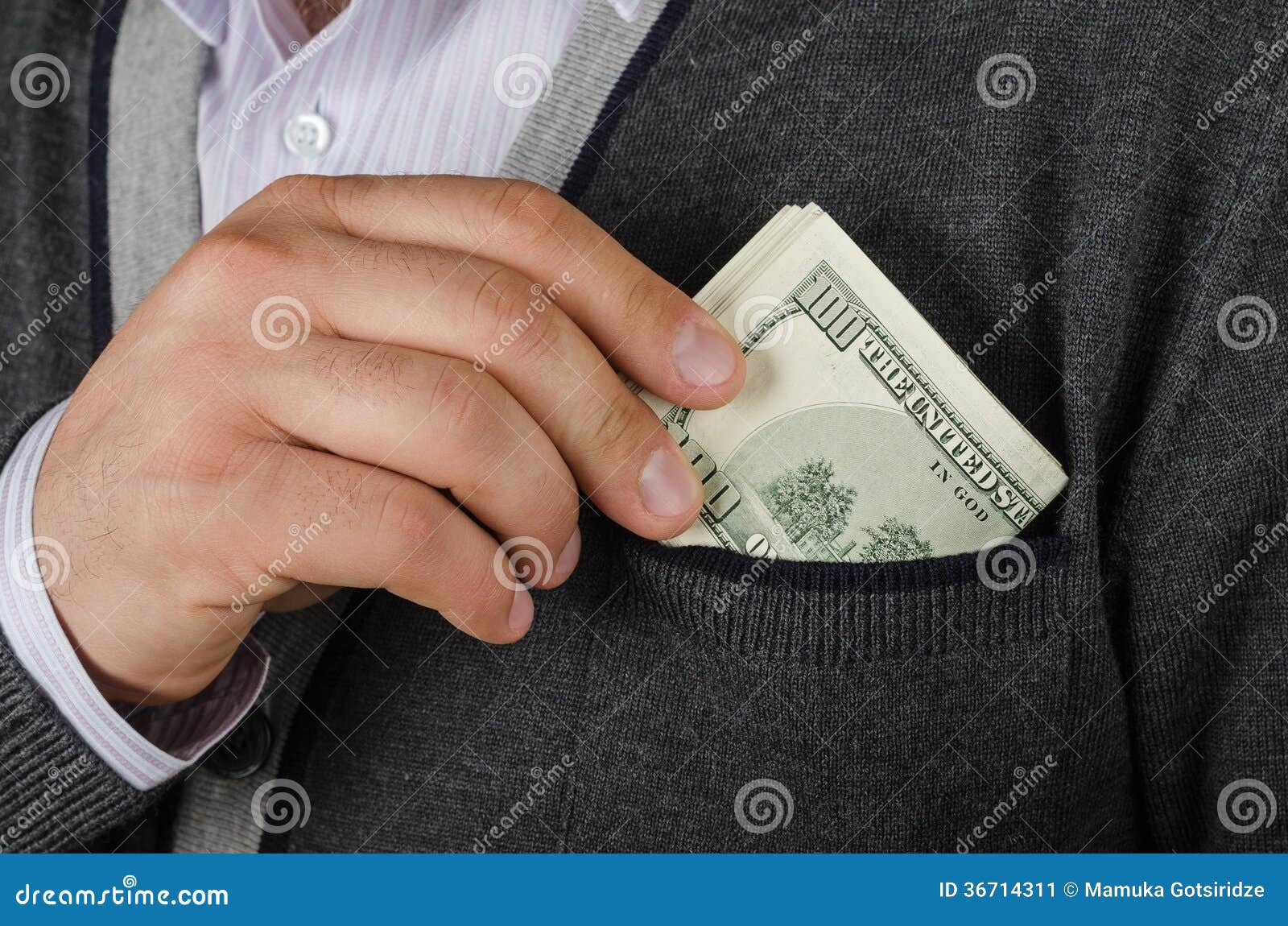 Putting dollar of pocket stock image. Image of putting - 36714311