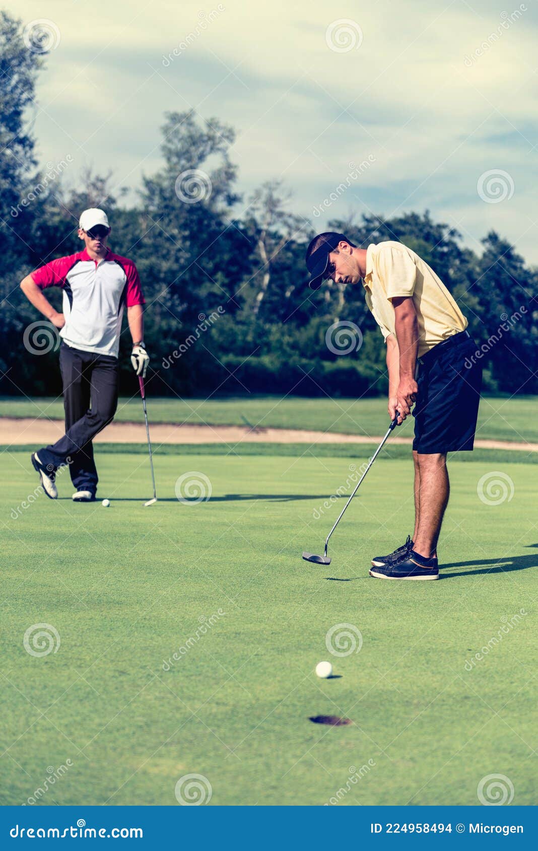 On the putting green stock photo. Image of adult, golfer - 224958494