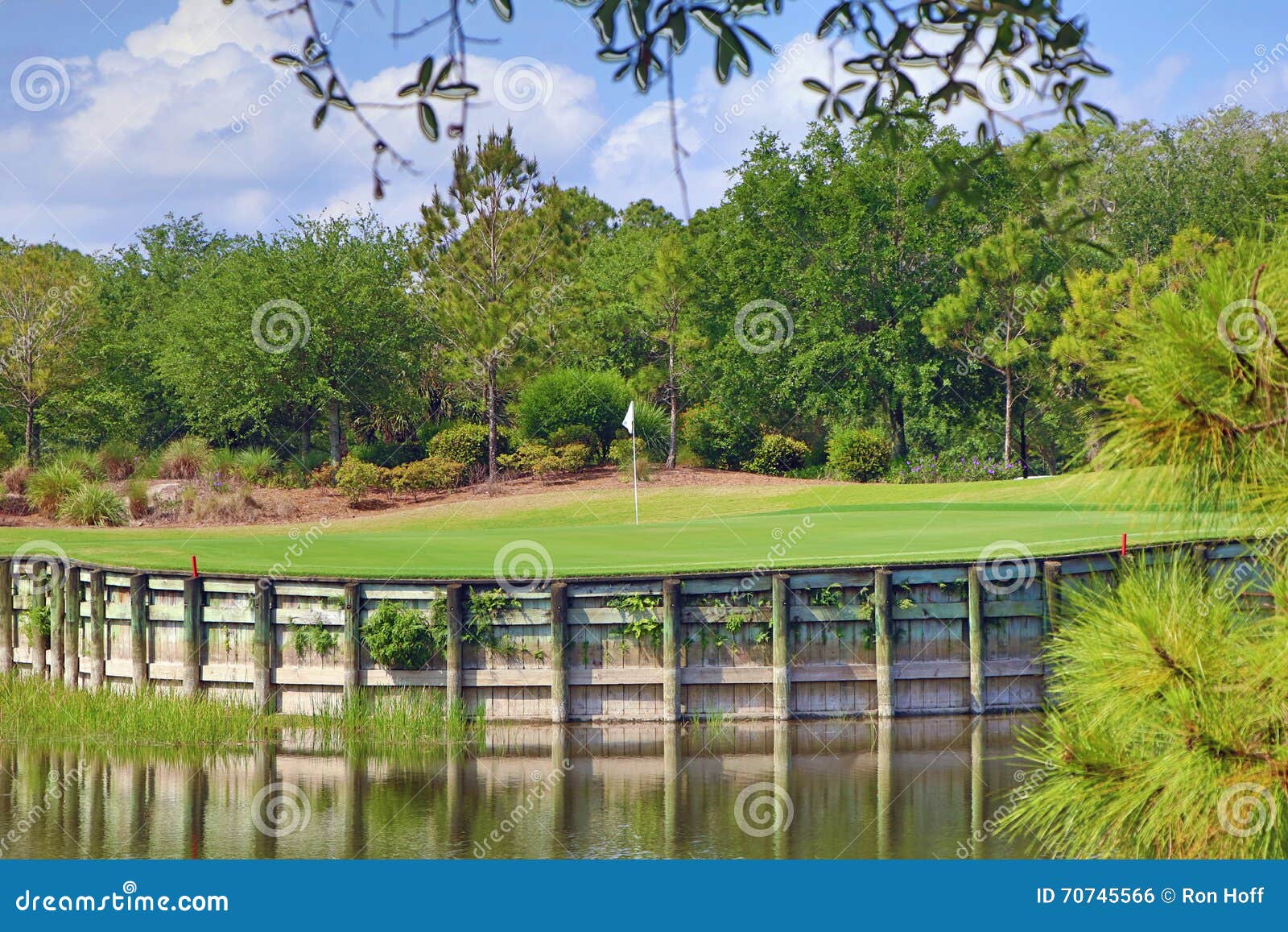 Putting Green and Retaining Wall Stock Photo - Image of wall, retaining ...