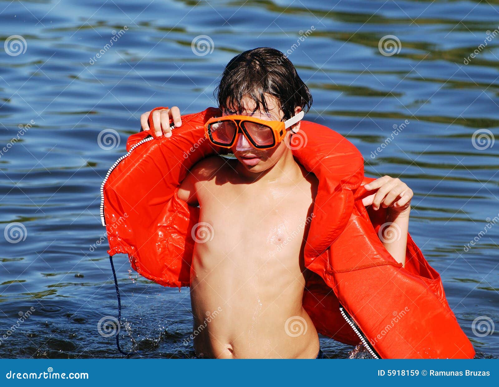Putting on Life-jacket stock image. Image of diving, child - 5918159