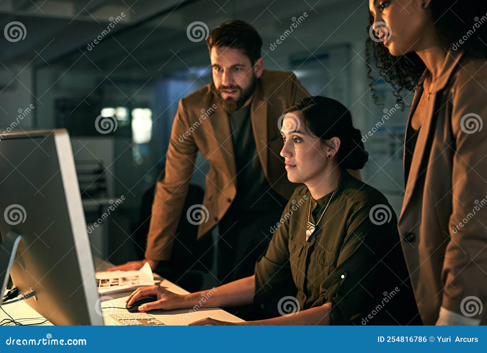 Putting Our Work Above Everything Else. Colleagues Working Late. Stock ...