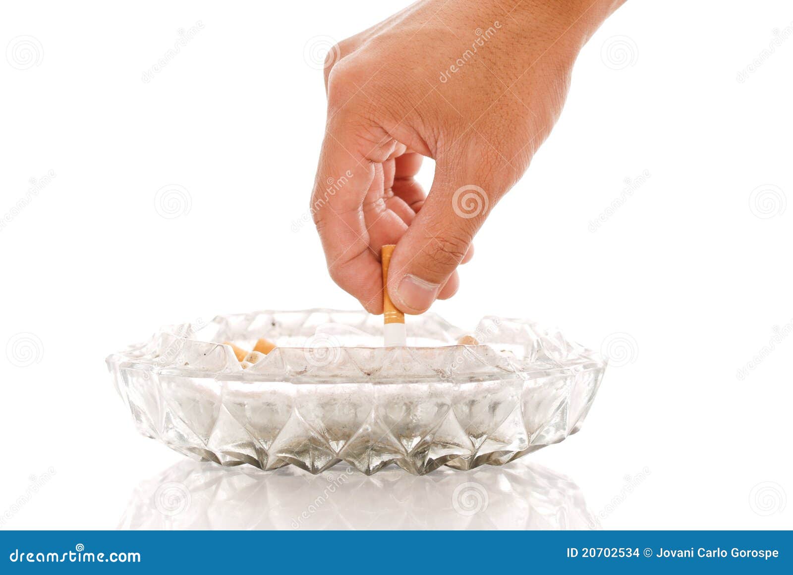 Putting Out a Cigarette stock photo. Image of health - 20702534