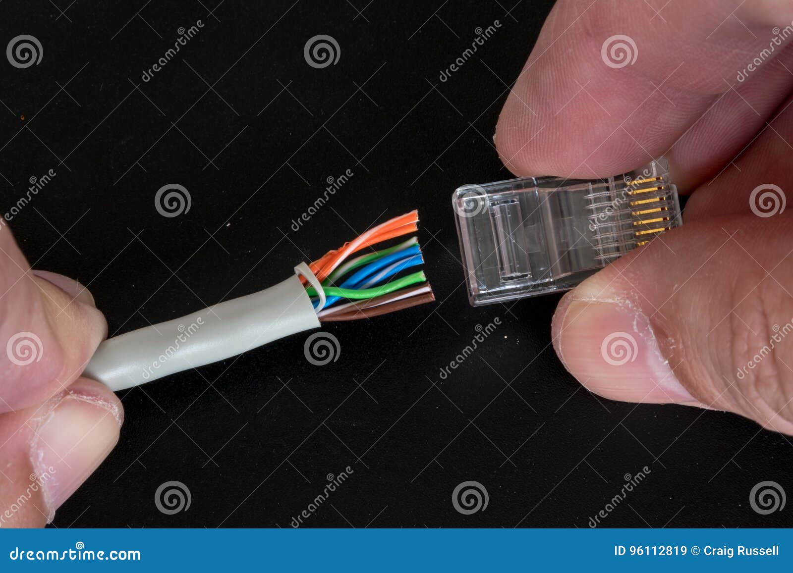 Putting RJ45 Plug Onto Ethernet Cable Stock Image - Image of ...