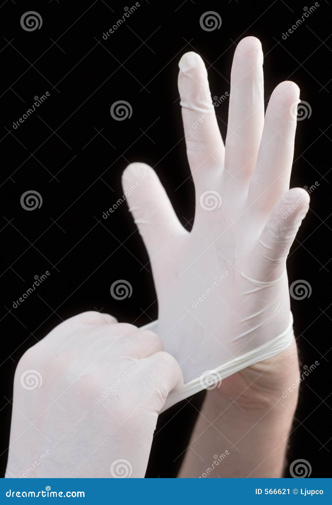 Putting on rubber gloves stock image. Image of operation - 566621