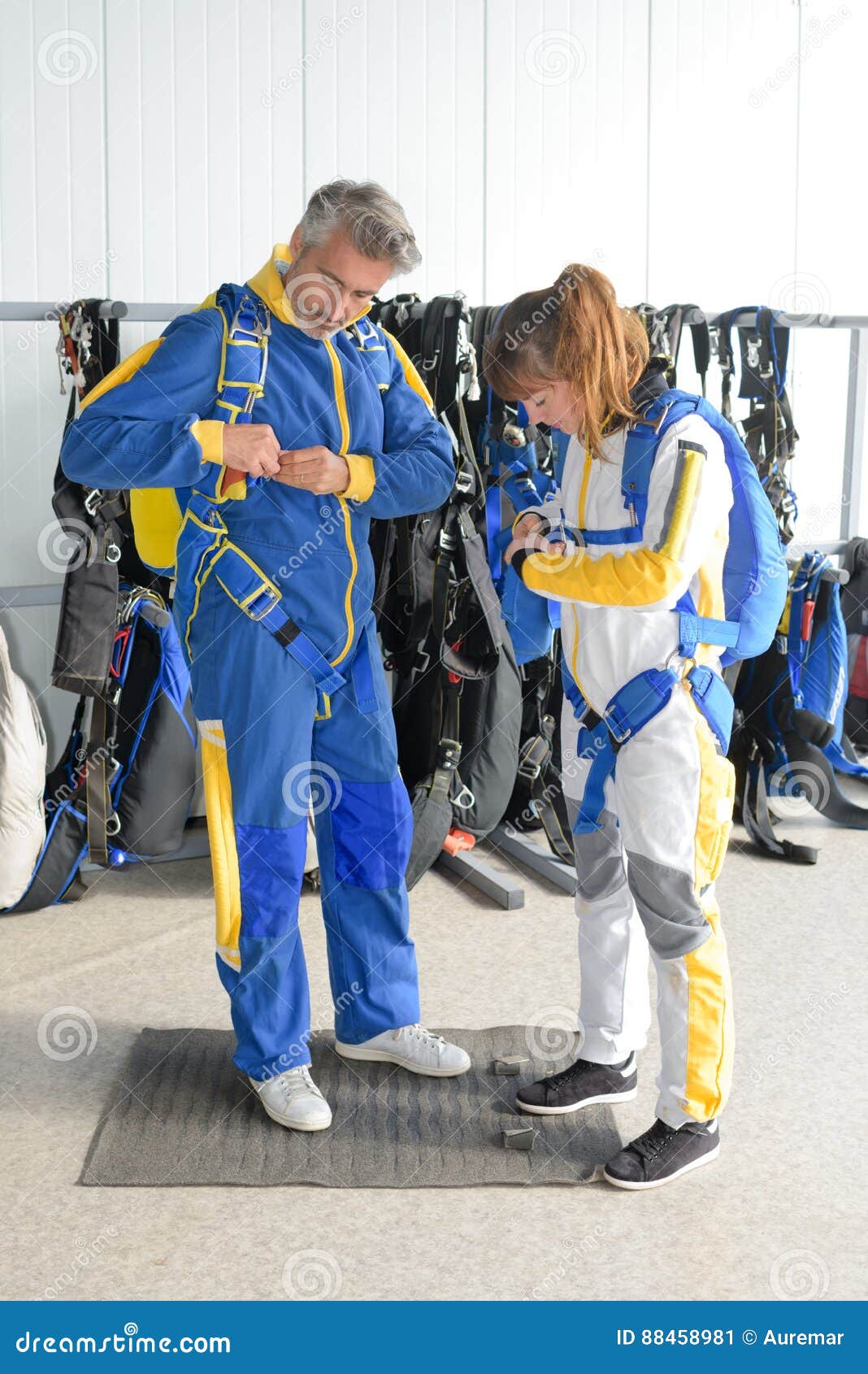 Putting on Skydiving Equipment Stock Image - Image of skydiver ...