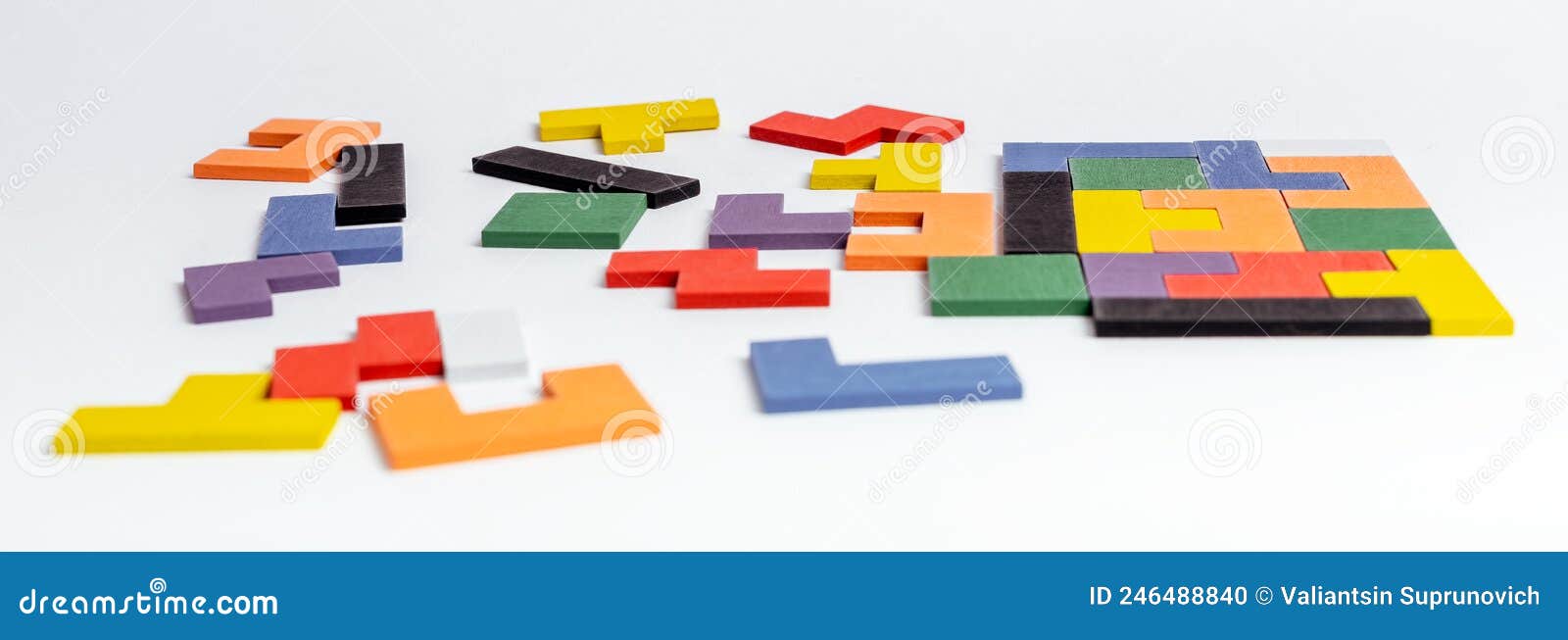 Putting Tetris Puzzle Pieces Together. Wooden Logic Game for Children ...