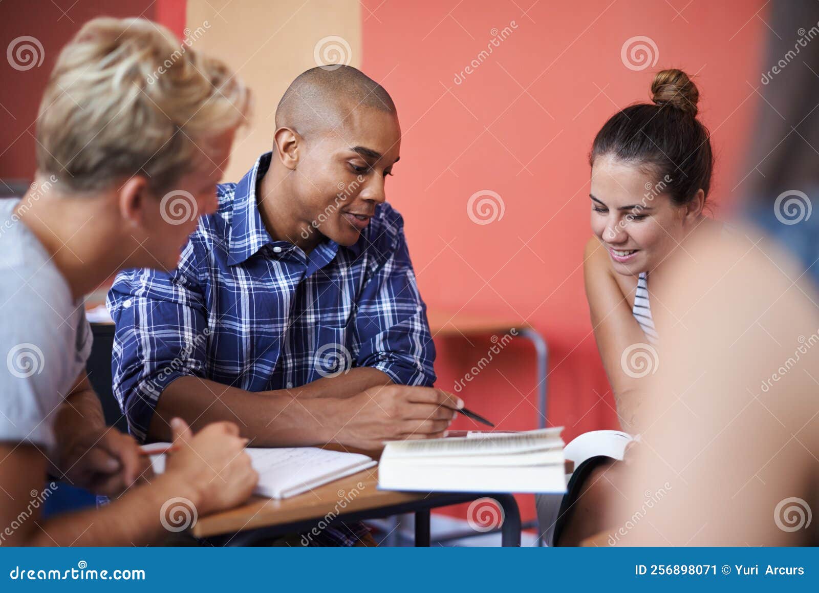 Putting Their Assignment Ideas on Paper. a Group of University Students ...
