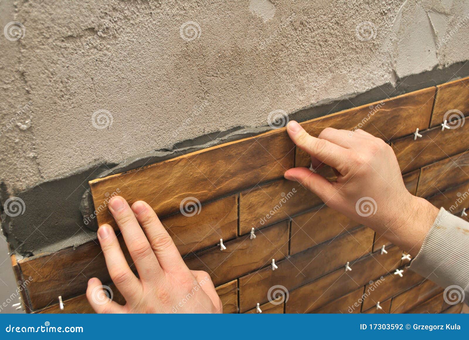 Putting tiles stock photo. Image of tiler, brick, manual - 17303592