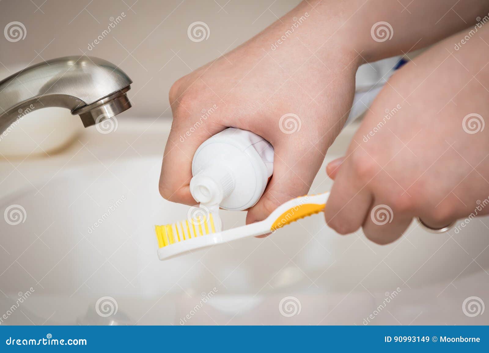 Putting on Toothpaste stock image. Image of hand, catching - 90993149