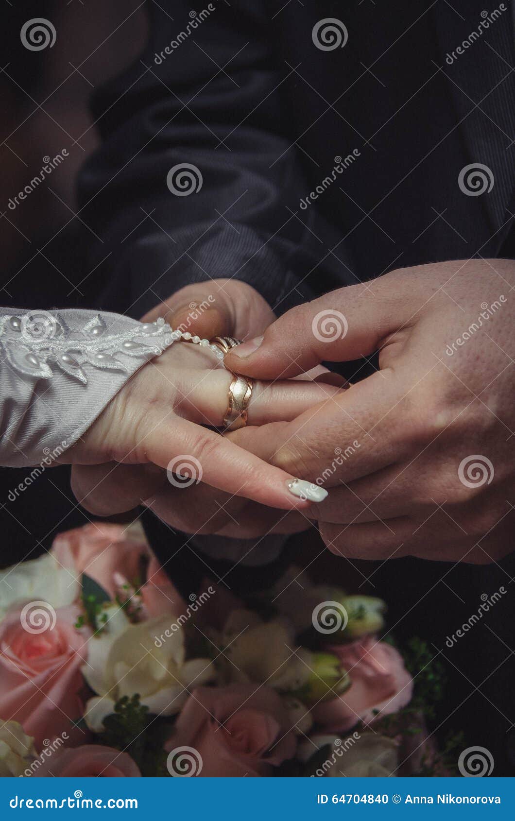 Putting on wedding rings stock photo. Image of bright - 64704840