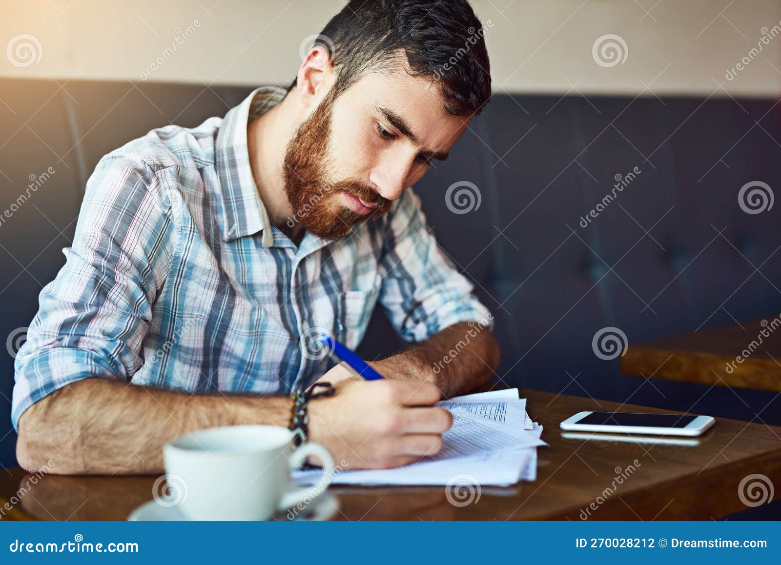 Putting in the Work. a Shop Owner Doing Some Paperwork. Stock Photo ...