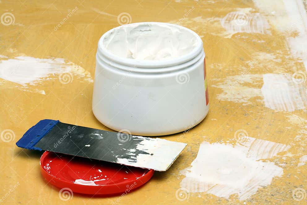 Putty knife with paste stock photo. Image of paste, scraper - 27202108