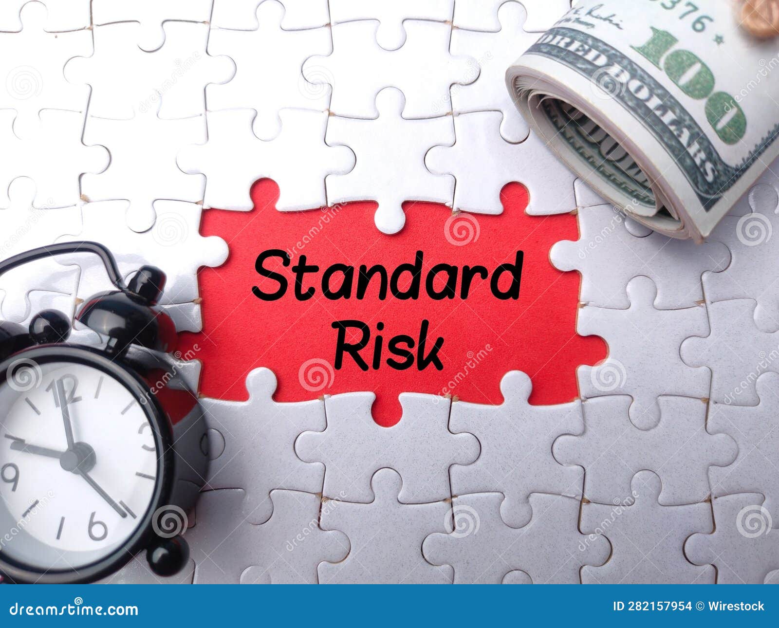 Puzzle Backdrop with Banknotes, Clock, and Text: Standard Risk ...