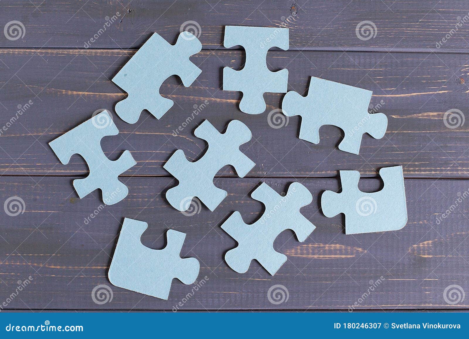 Puzzle Details in Disassembled Form on the Table Stock Image - Image of ...