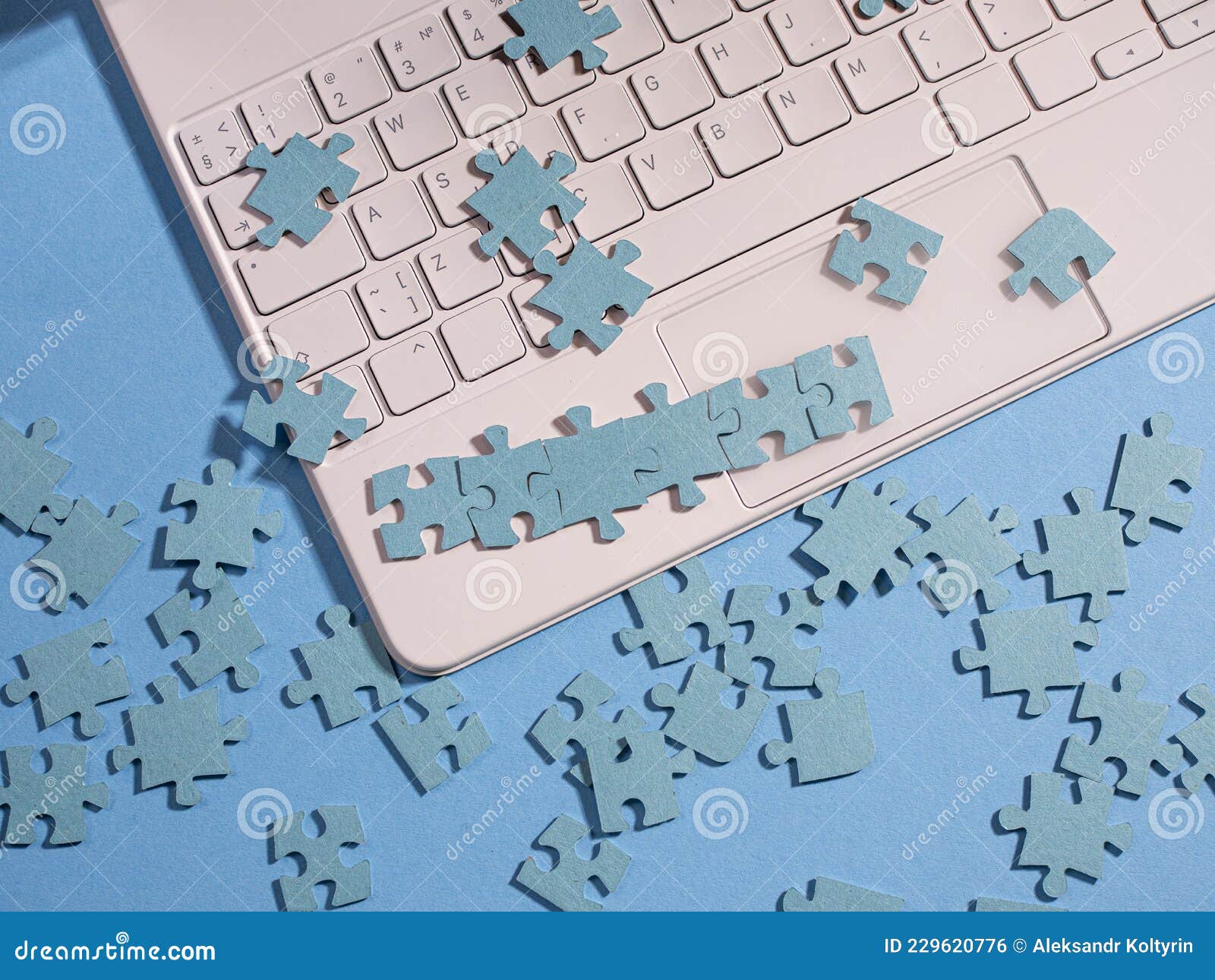 Puzzle Elements on a Laptop Keyboard, Software Development, Concept ...