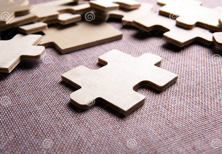 Puzzle Elements on a Texile Background As a Riddle Stock Photo - Image ...