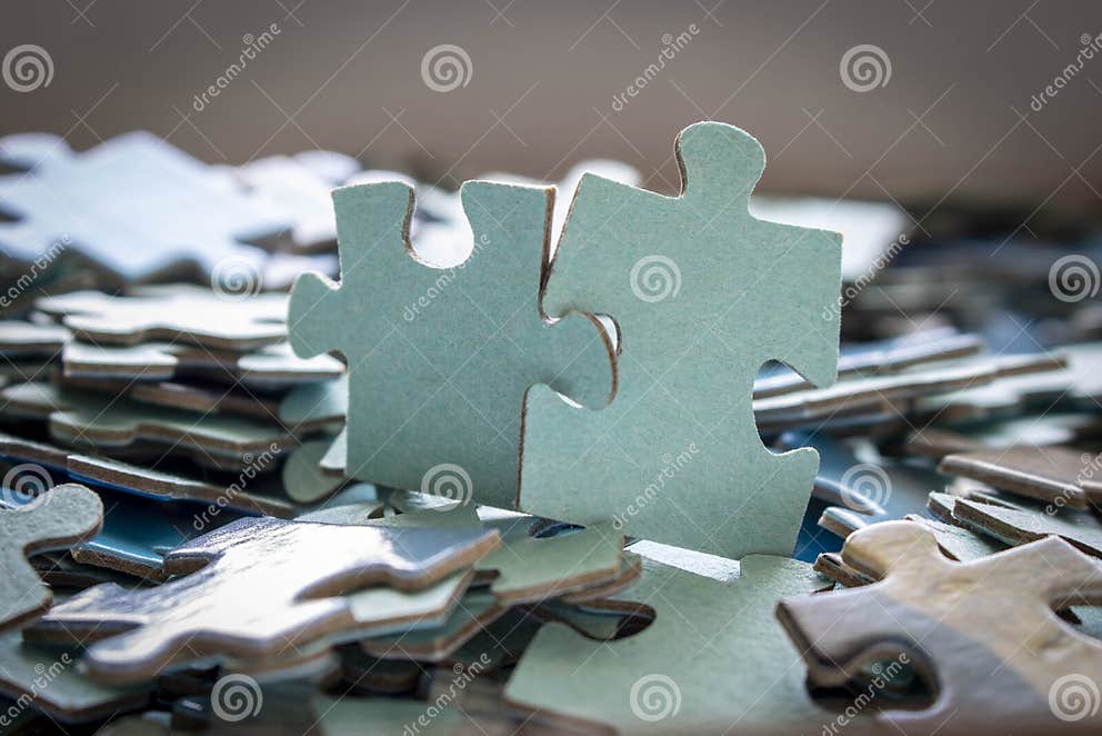 Puzzle. Many Puzzle Pieces on the Table Stock Image - Image of complete ...
