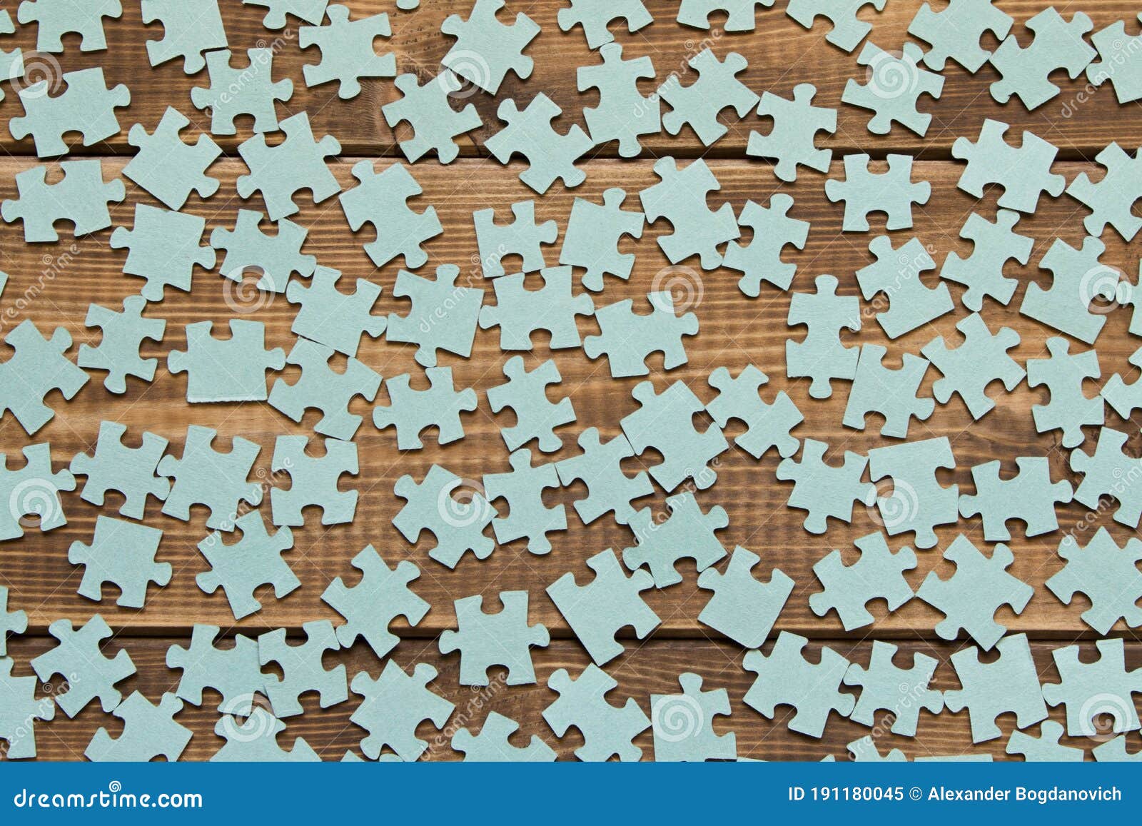 Puzzle. Many Puzzle Pieces on a Wooden Table Stock Image - Image of ...