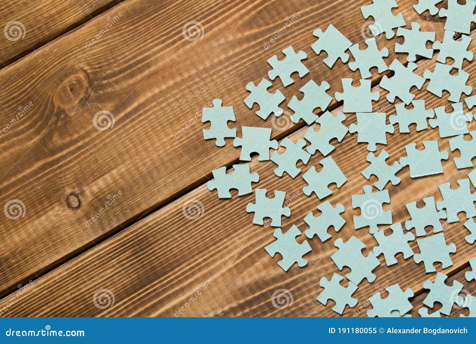 Puzzle. Many Puzzle Pieces on a Wooden Table Stock Image - Image of ...