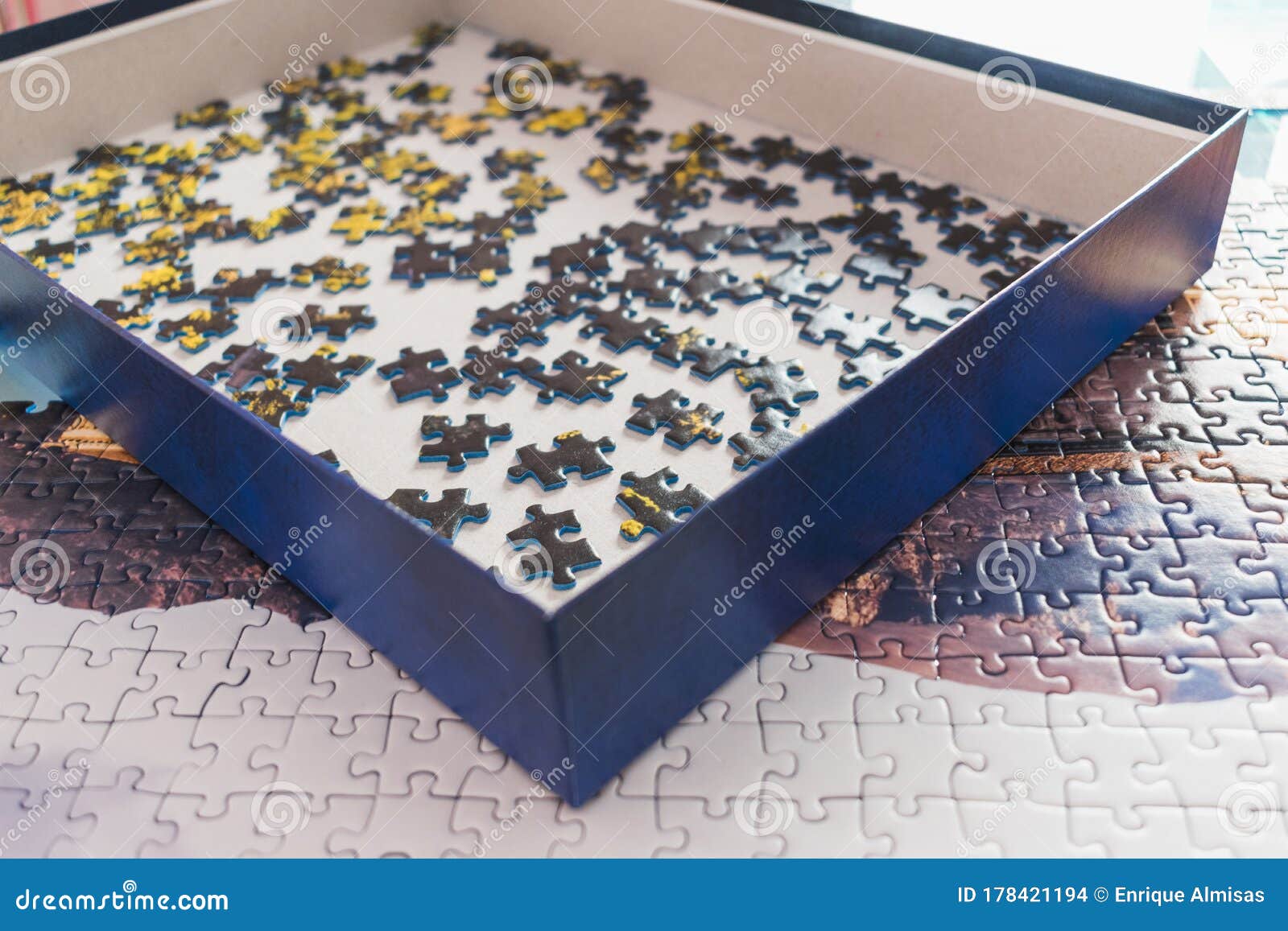 Puzzle Pieces in a Blue Box Stock Photo - Image of people, concept ...