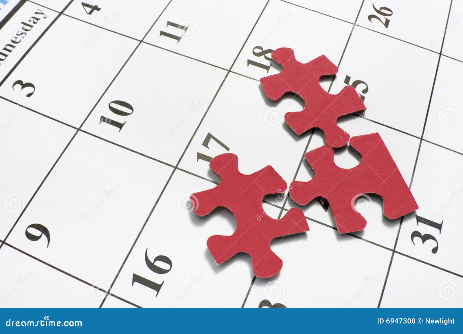 Puzzle Pieces on Calendar stock photo. Image of game, months - 6947300