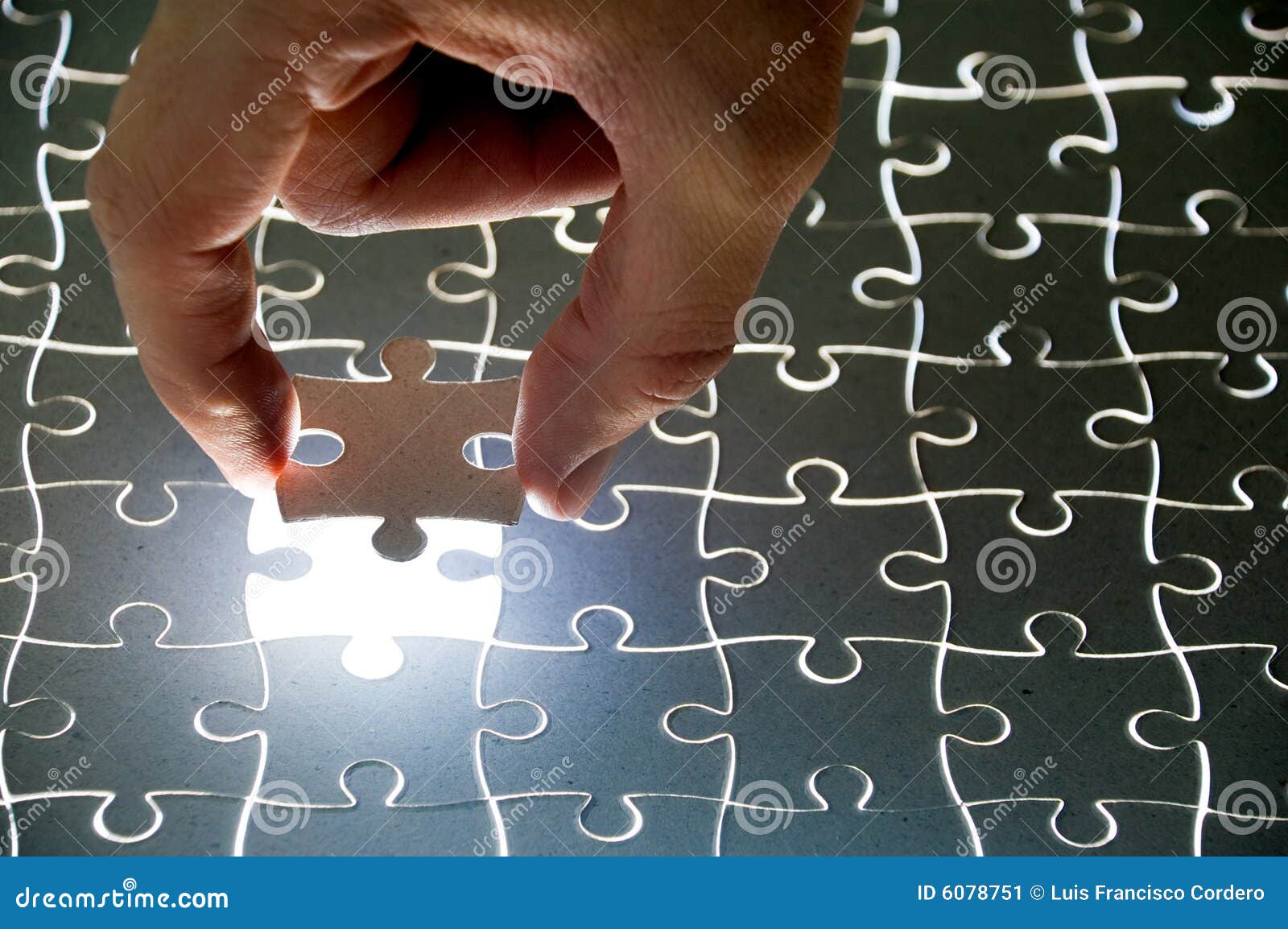 Puzzle pieces and hand stock image. Image of games, holding - 6078751