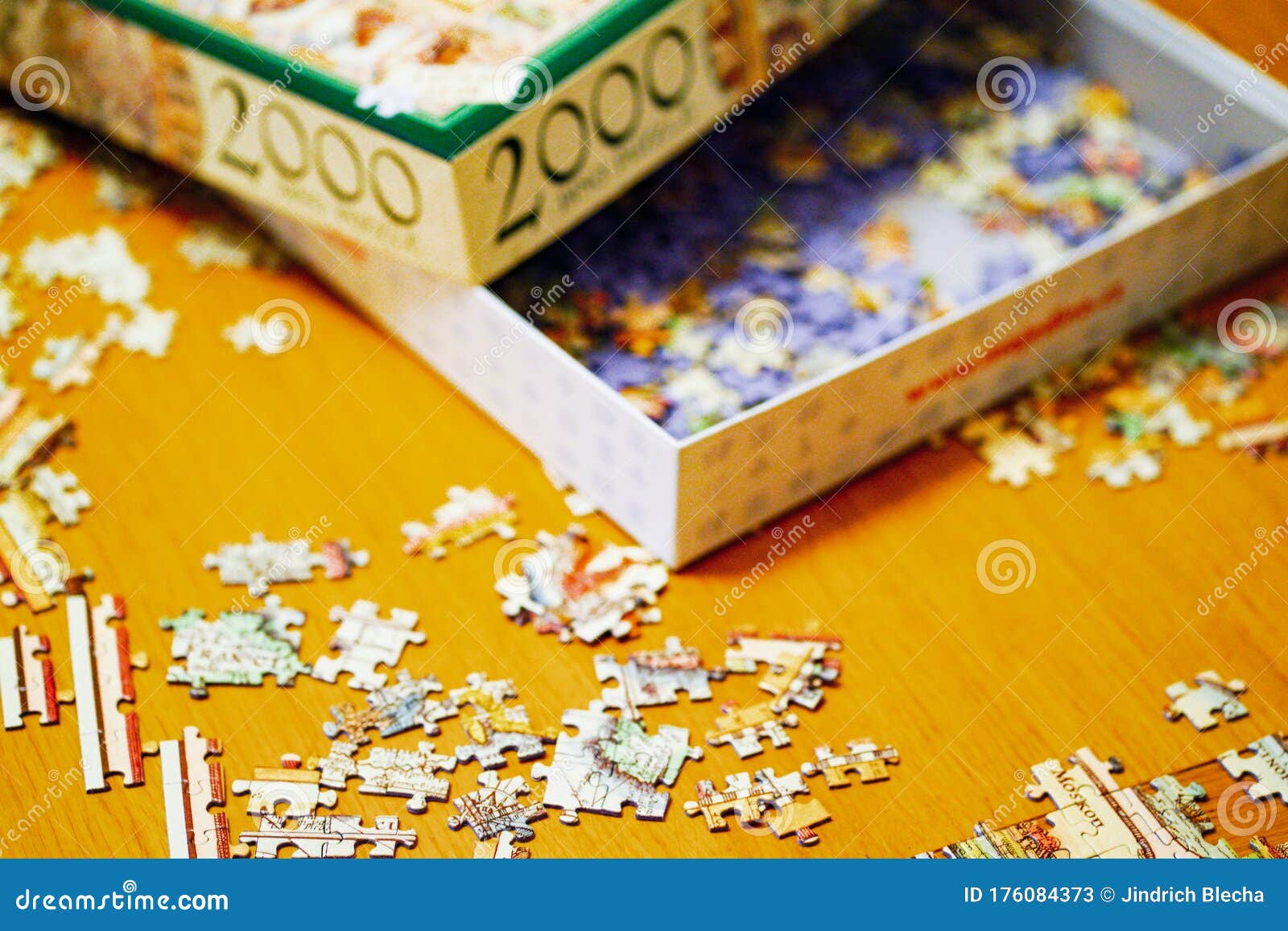 Puzzle Pieces Laying on Table with a Box Stock Image - Image of pieces ...
