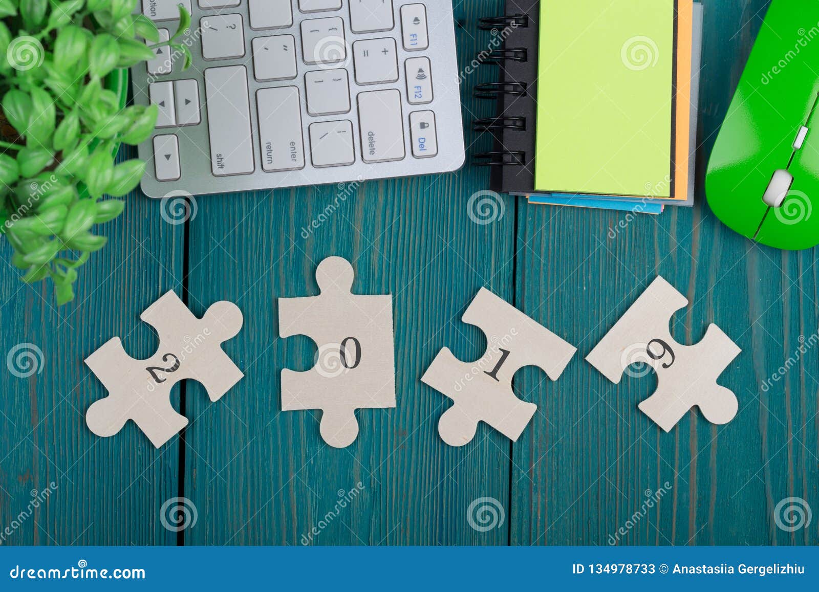 Puzzle Pieces with Text `2019`, Sketchbook, Computer Keyboard and Mouse ...