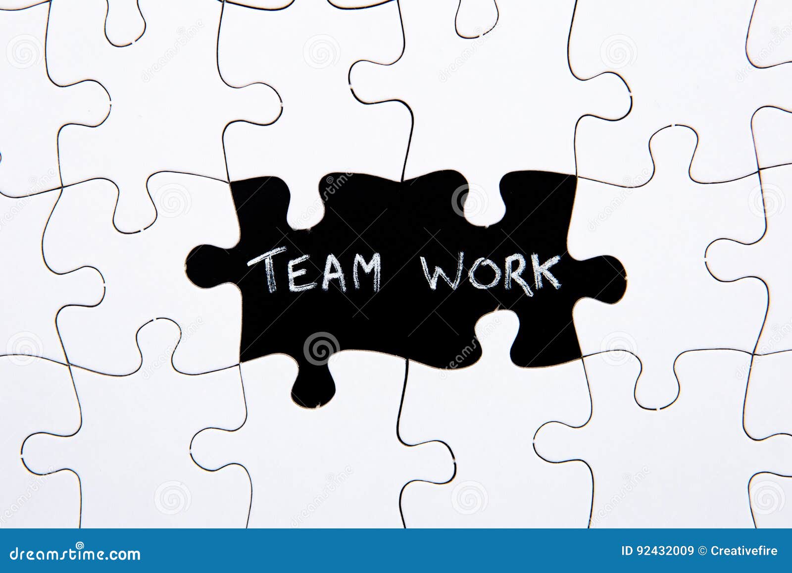 Puzzle Pieces - with Word Team Work in Missing Space Stock Image ...