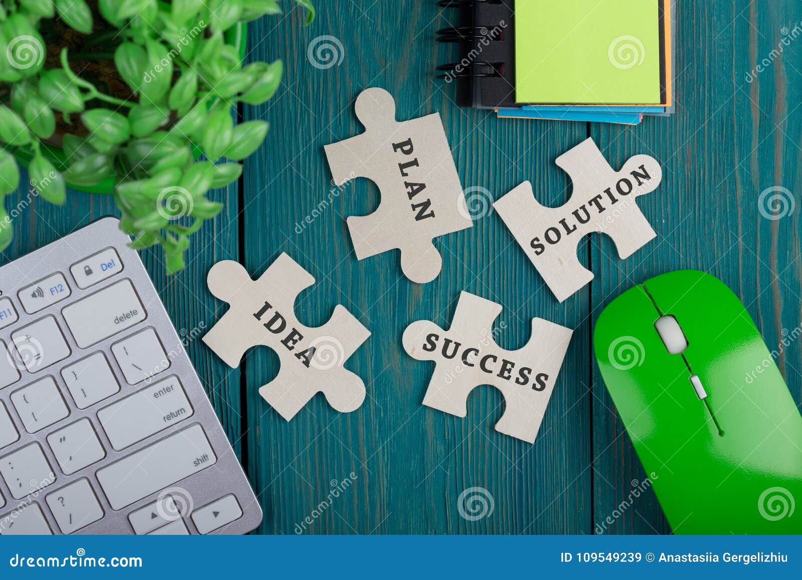 Puzzle Pieces with Words `idea`, `plan`, `solution`, `success ...