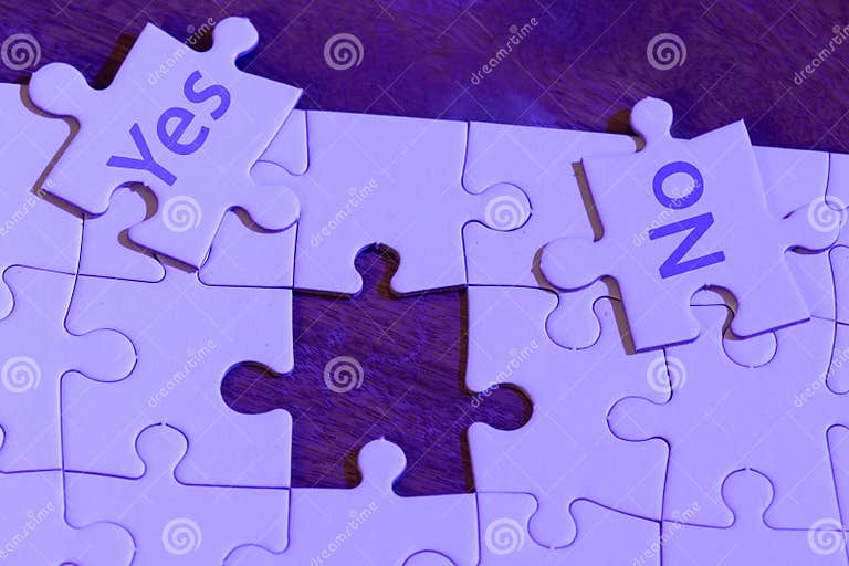 A Puzzle with the Word "yes" and "no" on it is Missing a Piece Stock ...